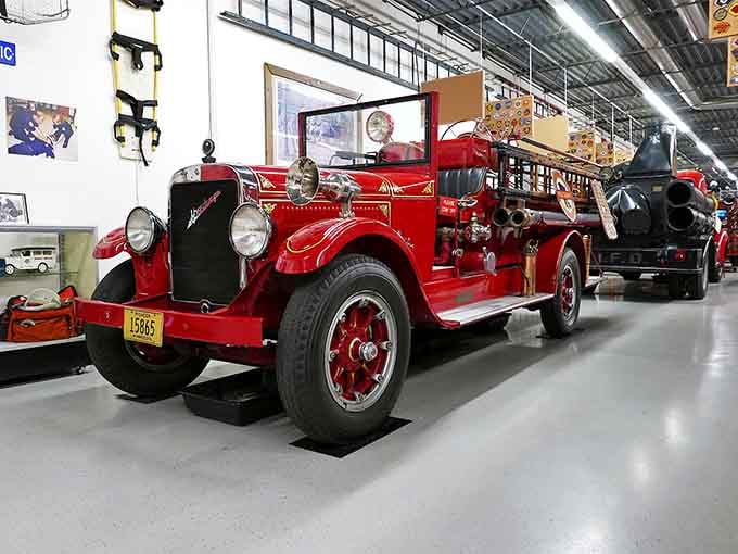 This gleaming vintage fire truck showcases the craftsmanship and attention to detail that made these machines true works of mechanical art.