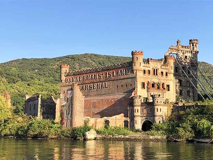 That massive "BANNERMAN'S ISLAND ARSENAL" sign proves someone understood the power of advertising before billboards were even invented.