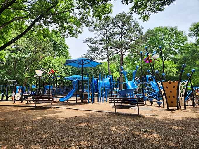 That electric blue playground equipment isn't just eye-catching, it's basically a kid magnet that works better than any screen.