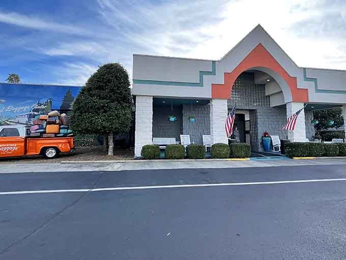 The building's distinctive architecture with its coral-colored archway welcomes you to America's most unusual shopping adventure.