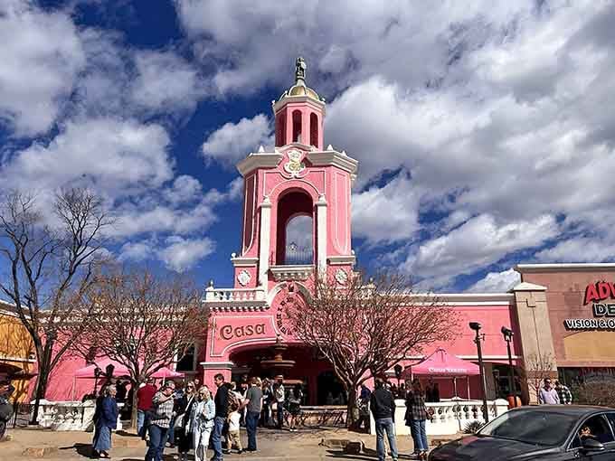 That pink tower isn't a mirage in the parking lot, it's your gateway to the most wonderfully weird dining experience in Colorado.