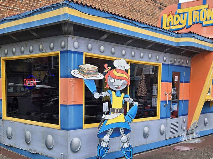 The building's retro-futuristic design with silver spheres announces this isn't your average lunch destination at all.