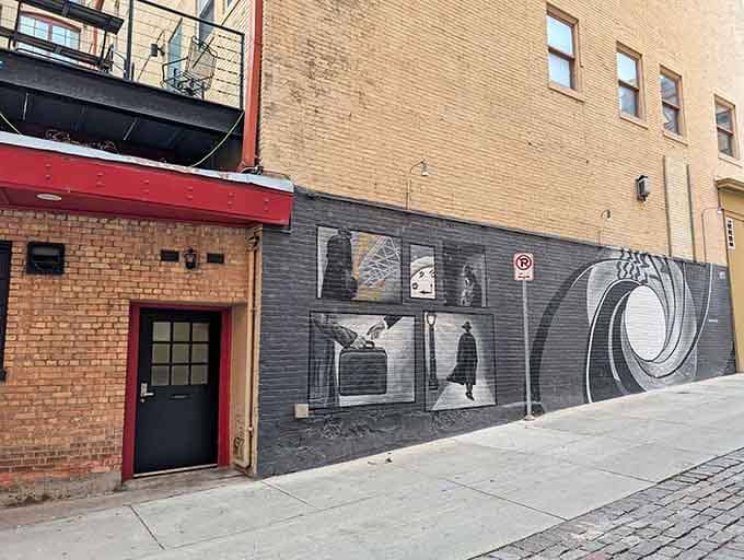 That unmarked door and spy-themed mural are your first clue that dinner just got interesting.