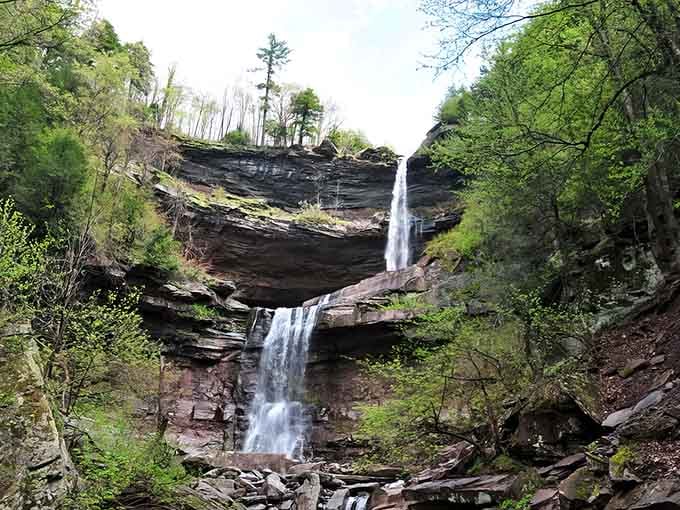 The two-stage waterfall creates its own amphitheater, framed by autumn's finest work in the Catskills.