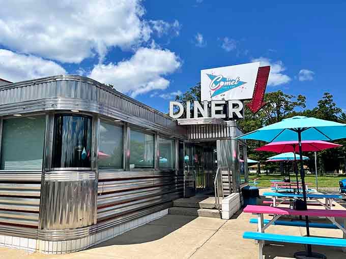 The Comet Classic Diner & Creamery gleams like a chrome-plated dream parked perfectly along your route to happiness.