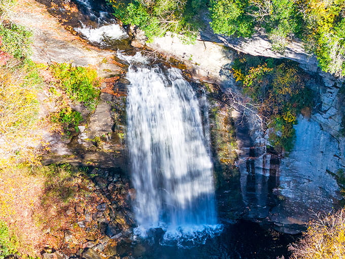 Autumn transforms the falls into a postcard scene so perfect you'll swear someone staged it just for you.