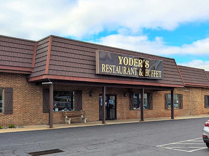 The unassuming exterior of Yoder's Restaurant & Buffet hides a culinary wonderland within. Like finding a secret passage to comfort food paradise in Lancaster County.