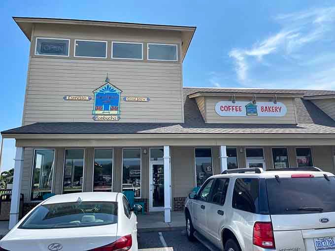 Those turquoise chairs aren't just furniture, they're a coastal welcome wagon inviting you to stay awhile.