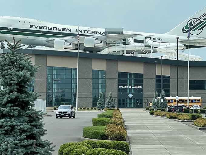 Nothing says "we mean business" quite like a full-sized cargo plane perched atop the building like a magnificent metal bird.