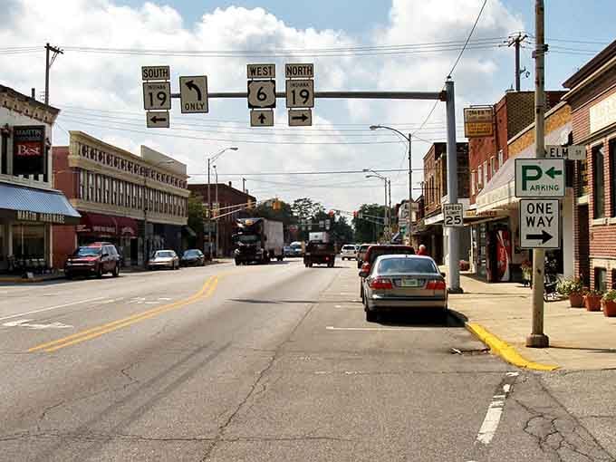 Main Street where buggies and cars share the road without a single road rage incident, proving civility isn't completely extinct.