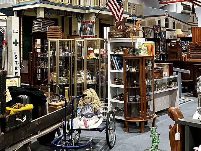 From creepy vintage dolls to patriotic displays, each vendor creates their own little universe of collectibles. That doll has definitely seen things.