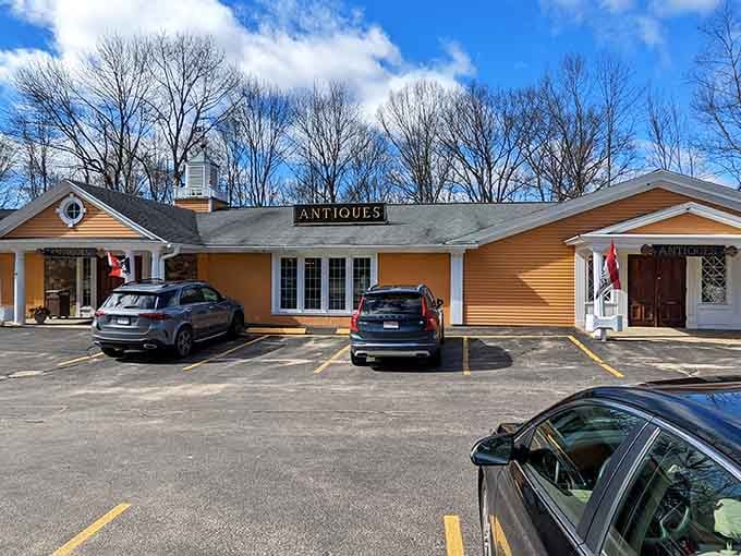 That cheerful yellow exterior practically begs you to pull over and discover what vintage magic awaits inside those doors.