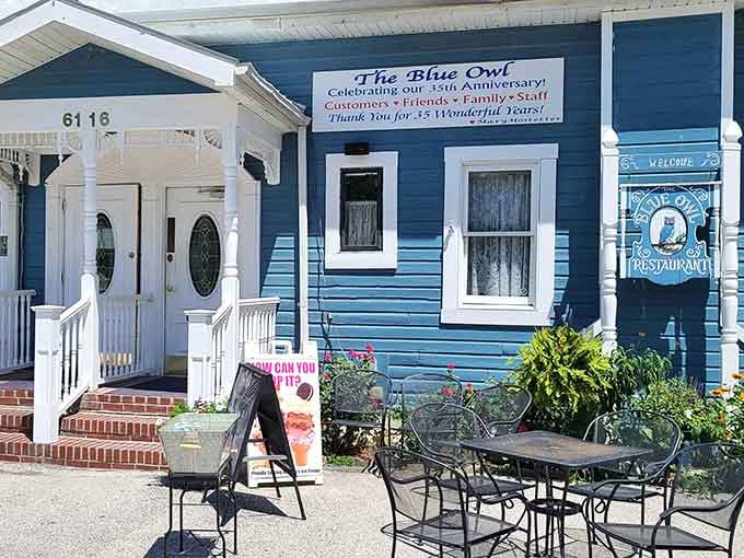 That blue and white facade isn't just charming, it's basically calling your name from down the street.