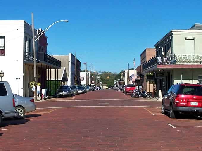 Red brick roads and historic facades line the streets like a perfectly preserved postcard from Texas history.
