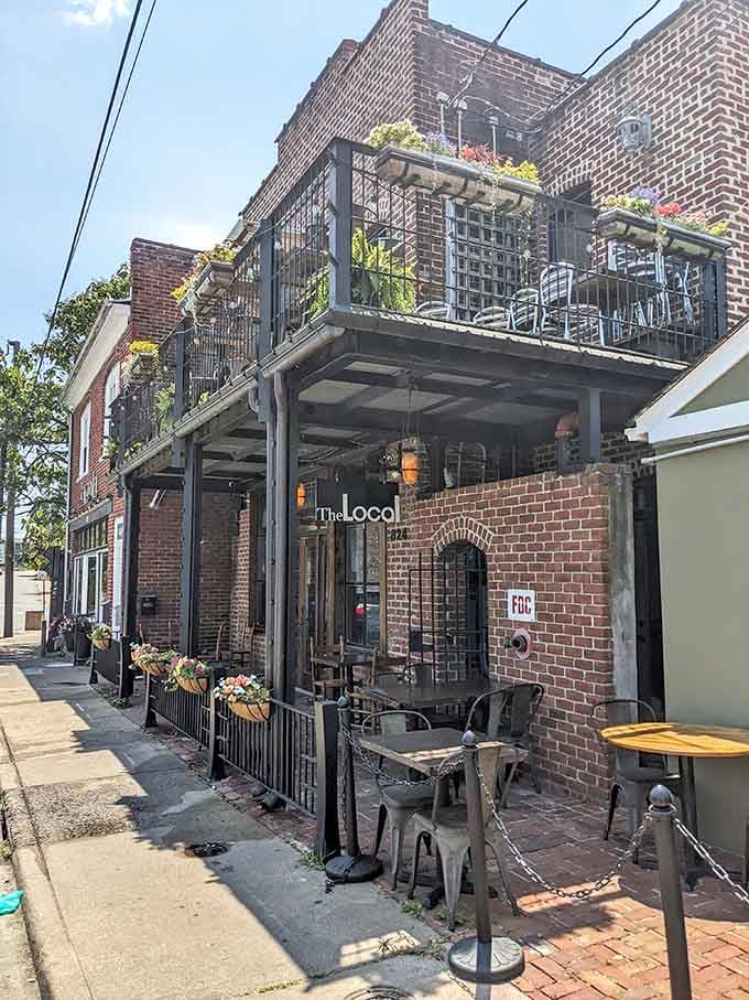 That brick facade and flower-adorned balcony aren't just pretty, they're your first clue you've found something special.