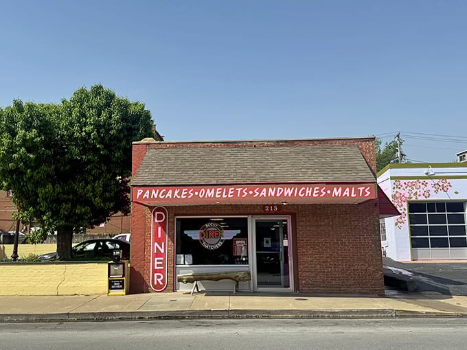 When the menu lists pancakes, omelets, sandwiches, and malts right on the building, you know they're proud of it.