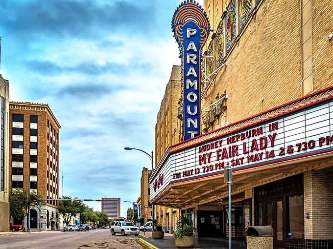 The Paramount Theatre's vintage marquee announces entertainment that won't require selling plasma to afford decent seats inside.