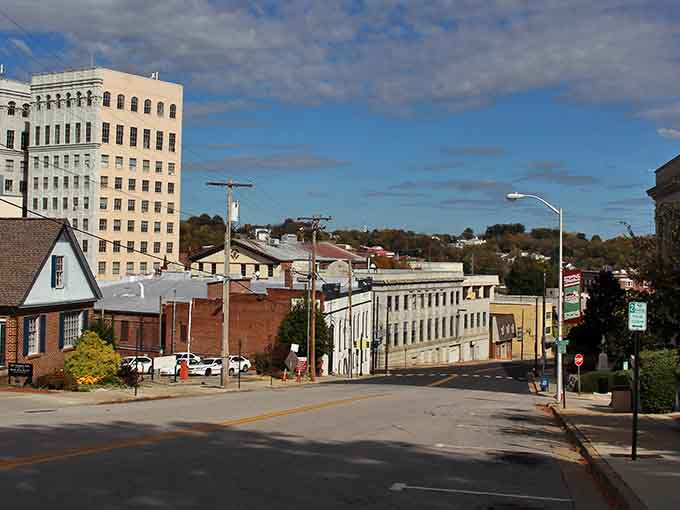 The city's architectural layers tell Danville's story, with the iconic white building standing sentinel over generations of change.