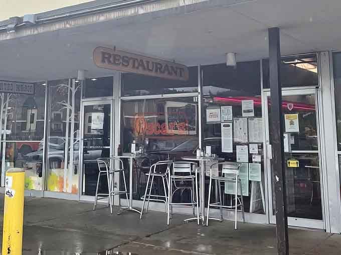 That classic diner storefront is like a time machine, except instead of flux capacitors, it runs on bacon grease and coffee.