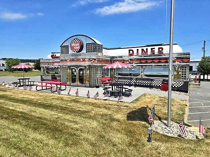 Wimpy & Dee's proudly displays its Americana spirit with checkered accents and small flags dotting the landscape around the diner.