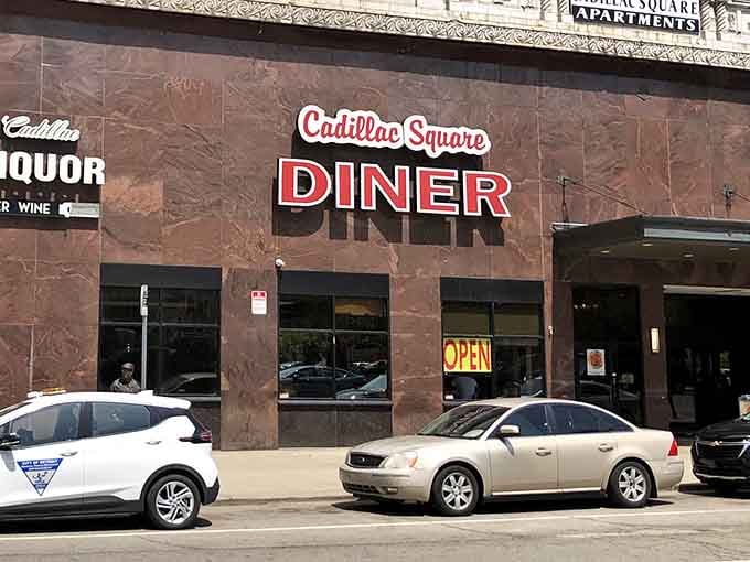 That classic diner sign beckons like a lighthouse for the hungry, promising comfort food and zero judgment about breakfast at 2 PM.