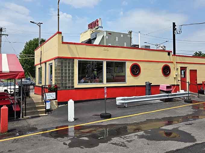 That red and cream exterior isn't just eye candy, it's a time machine to when diners actually looked like diners.
