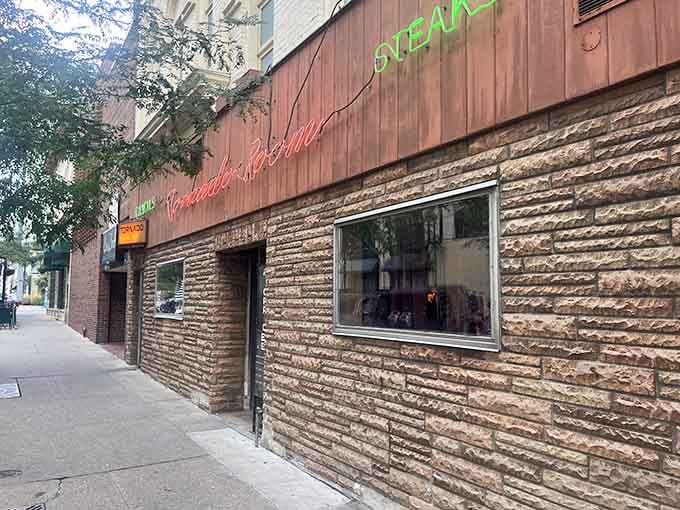 The exterior by daylight reveals architectural details that have survived decades while trends came and went like seasons.