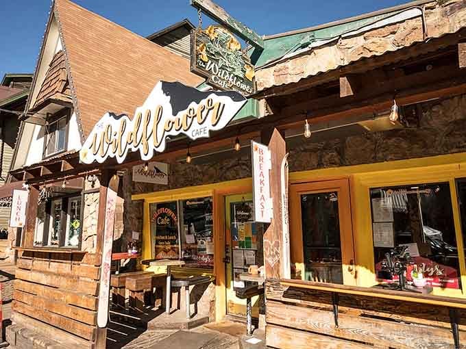 The rustic stone and warm wood exterior whispers "mountain charm" while those Wild Potatoes inside scream "culinary excellence."