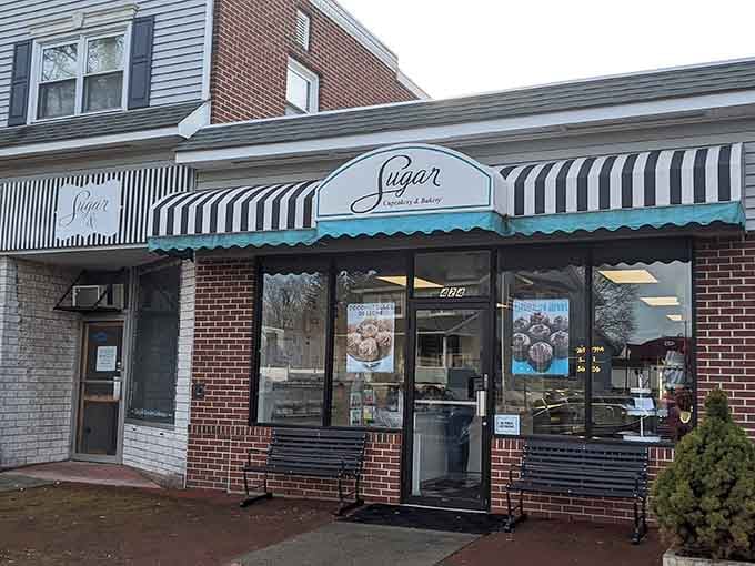 That classic striped awning isn't just charming, it's like a beacon calling you toward cupcake nirvana in East Haven.