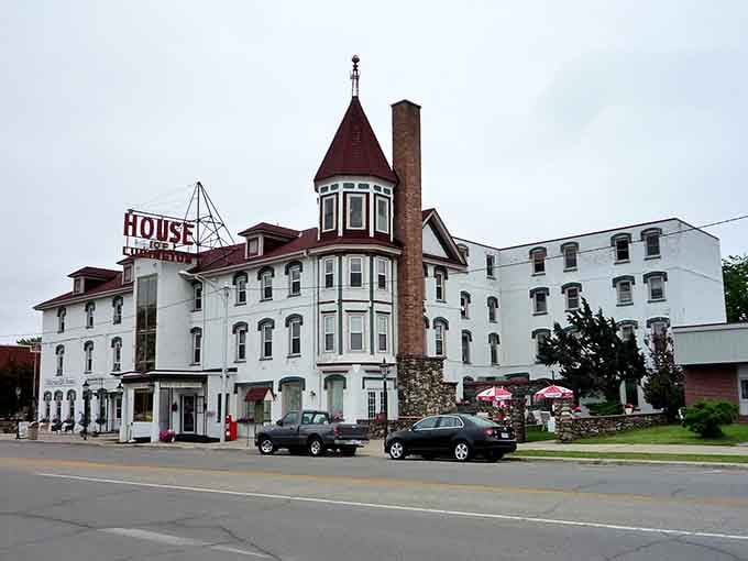 The House of Ludington stands like a Victorian time capsule, its grand white façade and distinctive tower whispering stories of lumber barons and lakeside prosperity.