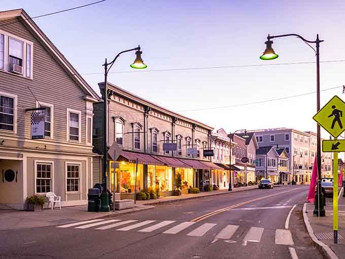 Downtown Mystic glows at dusk like a movie set that forgot to pack up and leave.