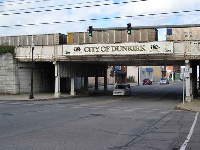 That railroad bridge welcomes you to Dunkirk, where infrastructure meets small-town charm without the pretension.