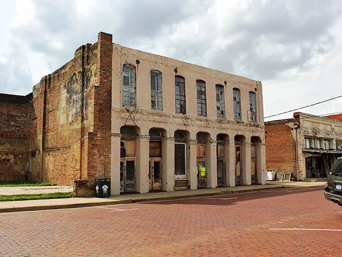 A weathered historic building stands as testament to Jefferson's boom days, its architectural bones still proudly visible despite the passage of time.