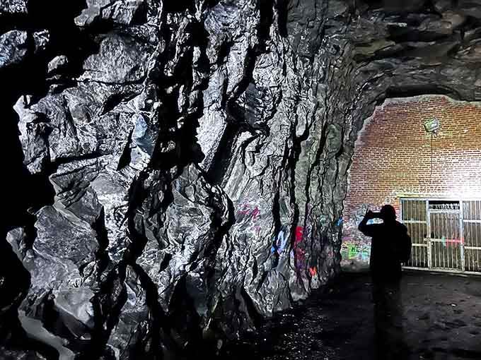 Standing at the sealed end feels like touching an unfinished dream frozen in time and stone.