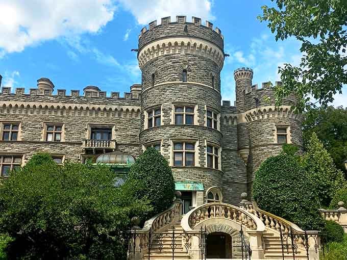 Summer greenery frames this Gothic masterpiece like nature decided to show off specifically for your Instagram feed today.