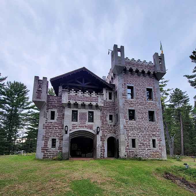Stone towers rising from Wisconsin soil like someone misplaced a piece of medieval Europe among the pines.