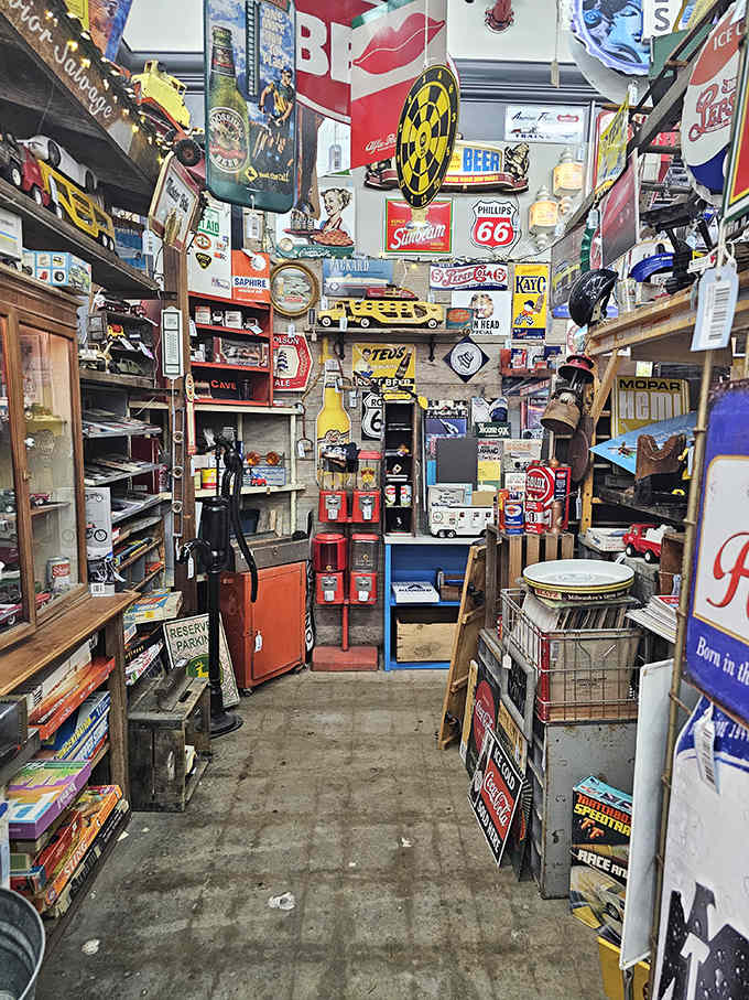 Wall-to-wall nostalgia! This booth is where vintage advertising goes to show off, with every inch covered in the colorful ghosts of brands past.