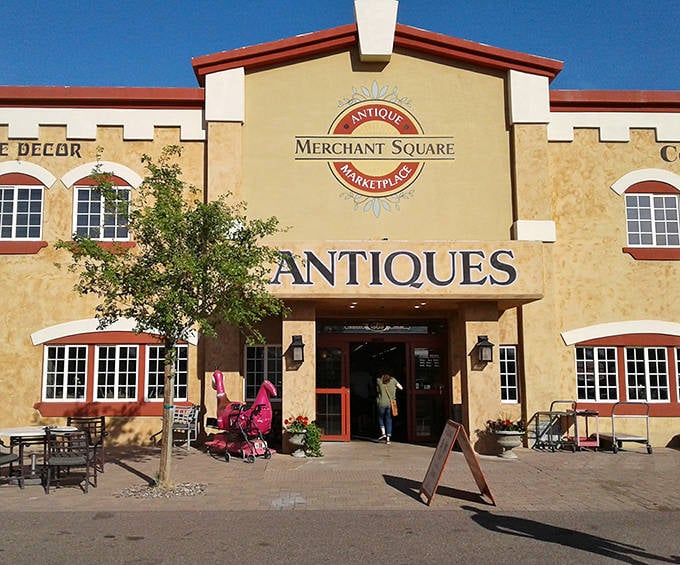 The castle-like exterior of Merchant Square promises treasure within, standing proudly under Arizona's brilliant blue sky.