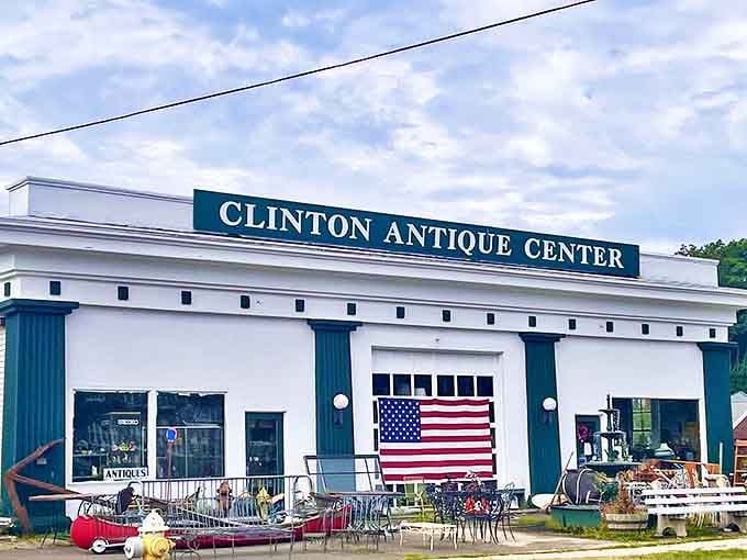 The iconic white facade with green trim of Clinton Antique Center beckons treasure hunters like a lighthouse for the nostalgic soul.