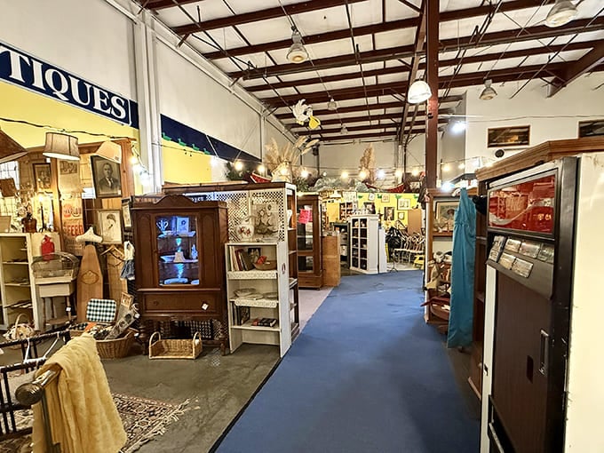 Warehouse-sized wonderland where every booth is its own universe of possibility. That blue carpet has guided countless treasure hunters to their "eureka" moments.