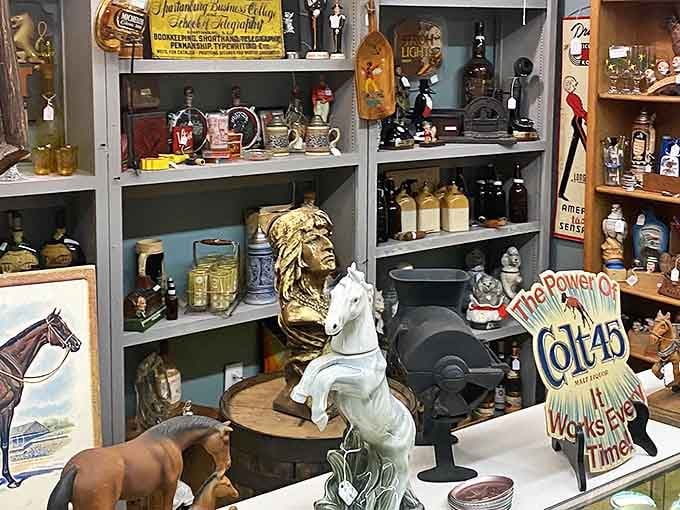 A treasure hunter's paradise! Native American busts, vintage signs, and collectible figurines create a museum-worthy display that whispers stories from America's past.