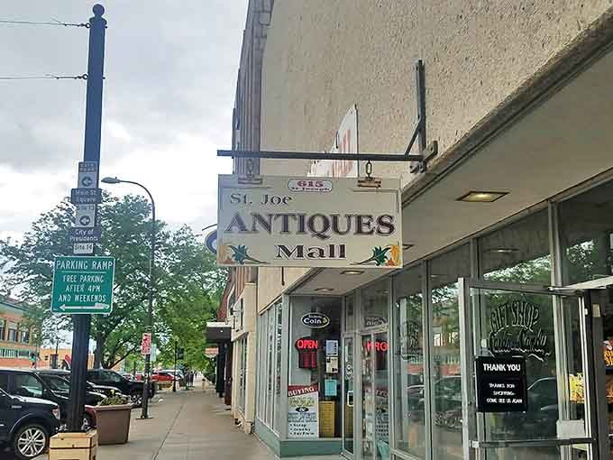 The unassuming storefront of St. Joe Antiques Mall beckons from downtown Rapid City, promising treasure hunters a portal to the past just steps from free parking.