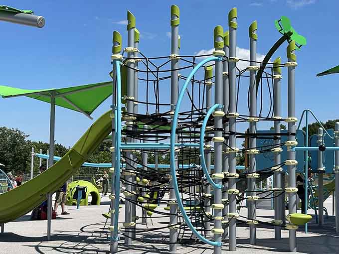 That towering climbing structure isn't just playground equipment, it's basically a training facility for future American Ninja Warriors.