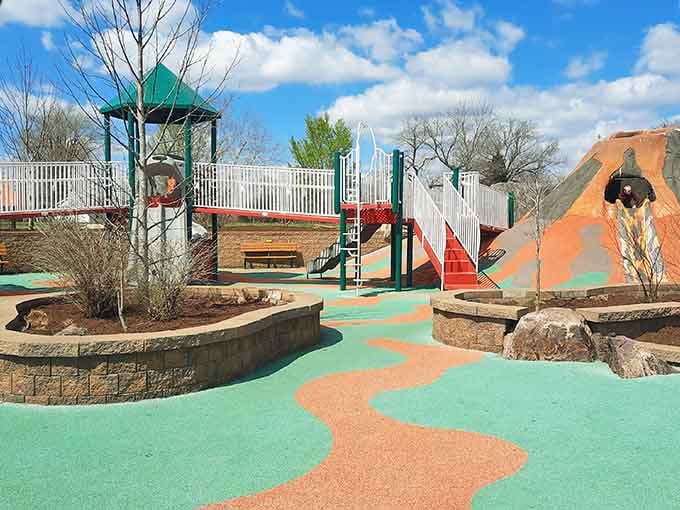 The colorful pathways wind through this playground paradise like a rainbow decided to permanently relocate to Missouri.