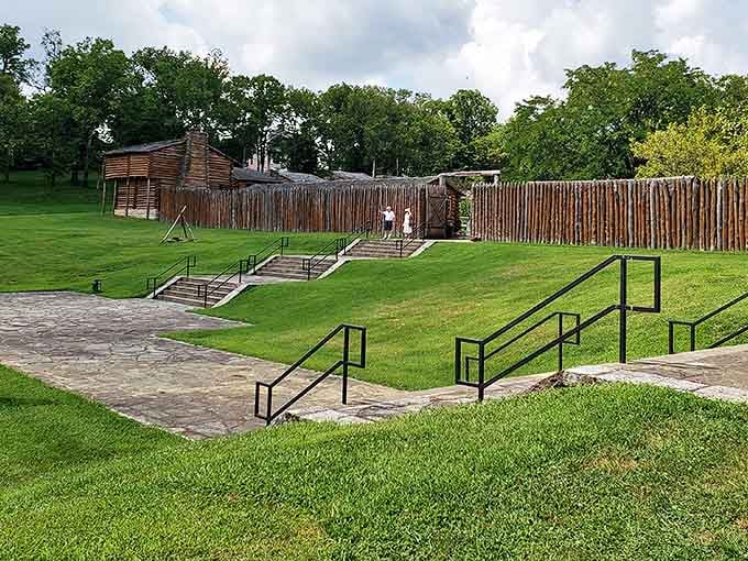 The impressive wooden palisade walls of Old Fort Harrod stand tall against the Kentucky sky, inviting visitors to step back into frontier America&mdash;no DeLorean required.