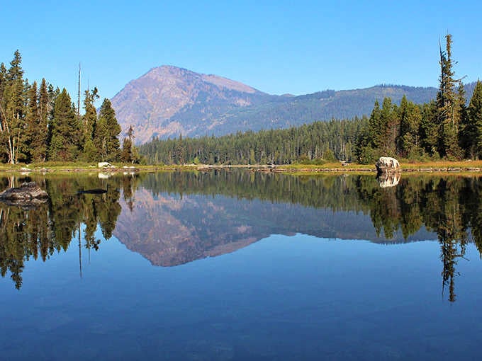 Mirror, mirror on the lake&mdash;nature's perfect reflection game creates a double dose of mountain majesty that'll make your Instagram followers weep with envy.