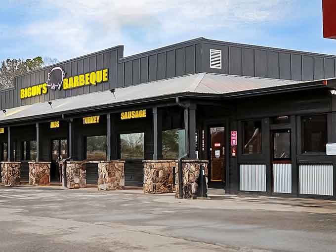 That bright yellow signage against gray metal tells you everything: serious barbecue happens here, no frills required.