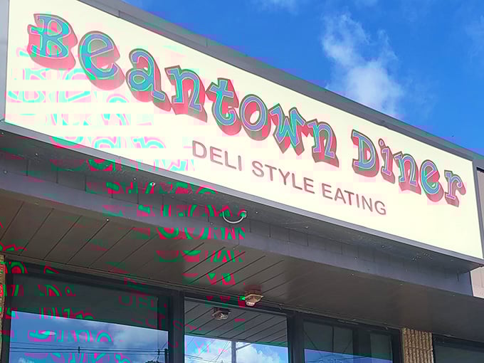 That playful pink and teal sign promises "Deli Style Eating" and delivers on every delicious word of it.