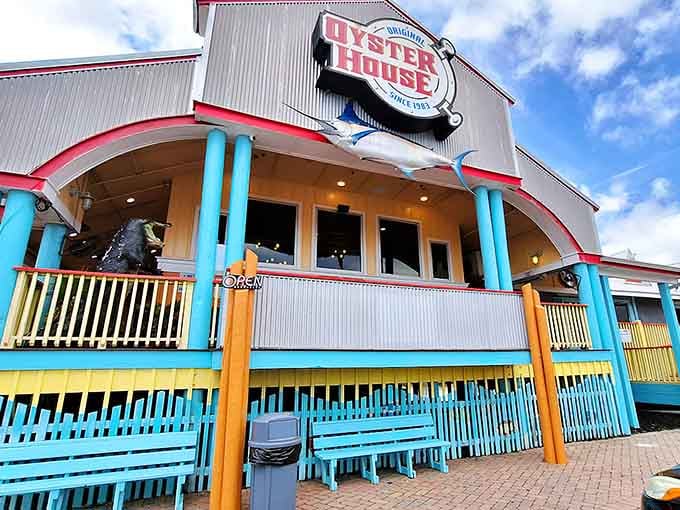 That turquoise and red color scheme isn't just cheerful—it's practically demanding you come inside for oysters.