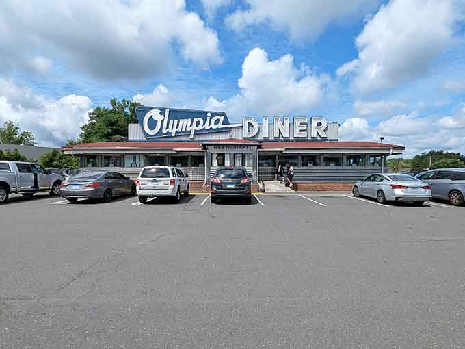 That gleaming stretch of stainless steel isn't just a diner, it's America's longest chrome-plated promise of comfort food.